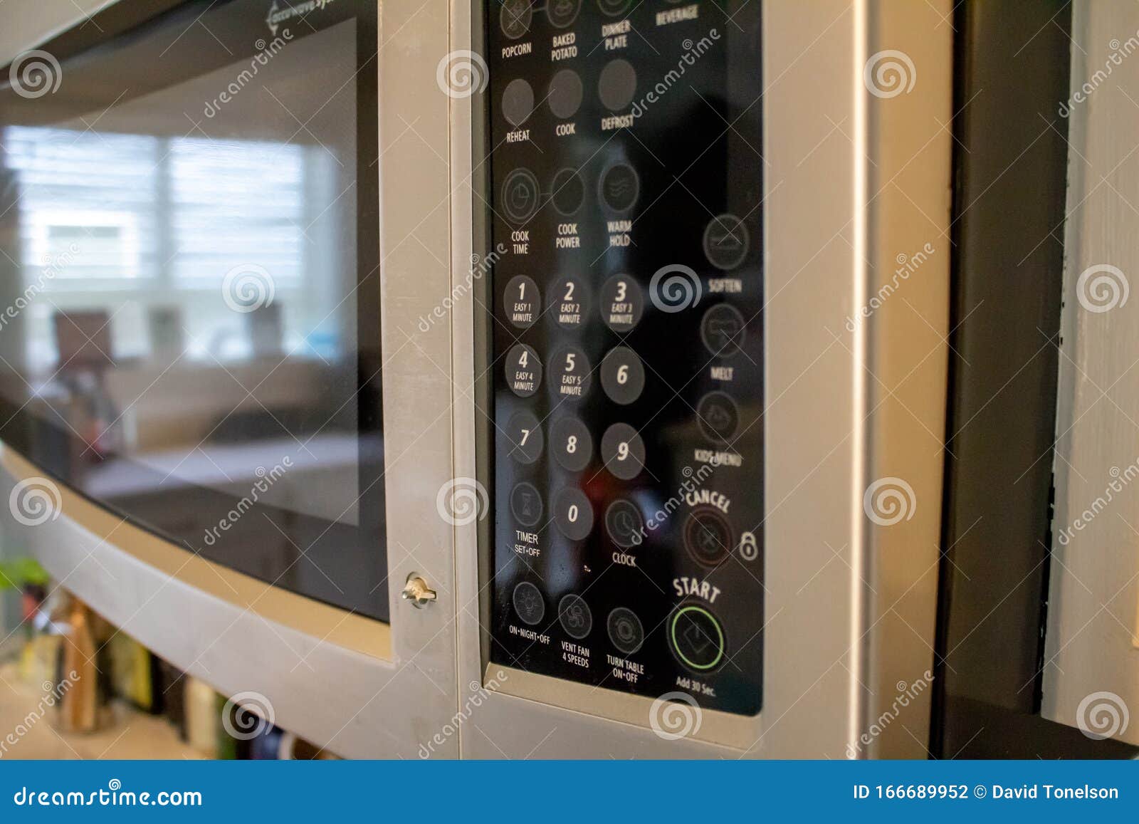 Microwave buttons editorial photography. Image of retail - 166689952
