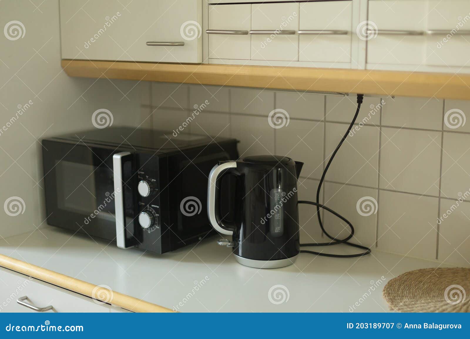 Microwave and Kettle in the Kitchen Stock Image - Image of equipment ...