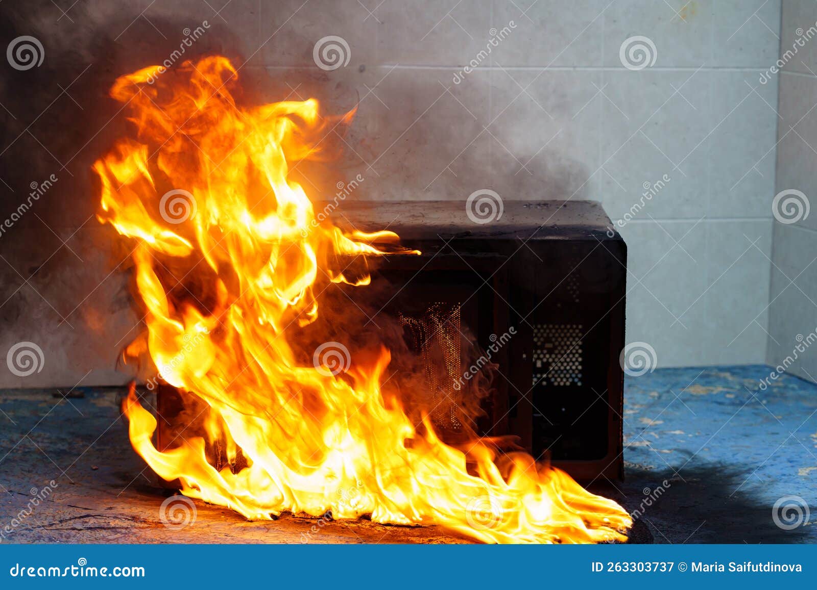 Microwave Oven on Fire. the Concept of Fire in the Kitchen. Stock Image ...
