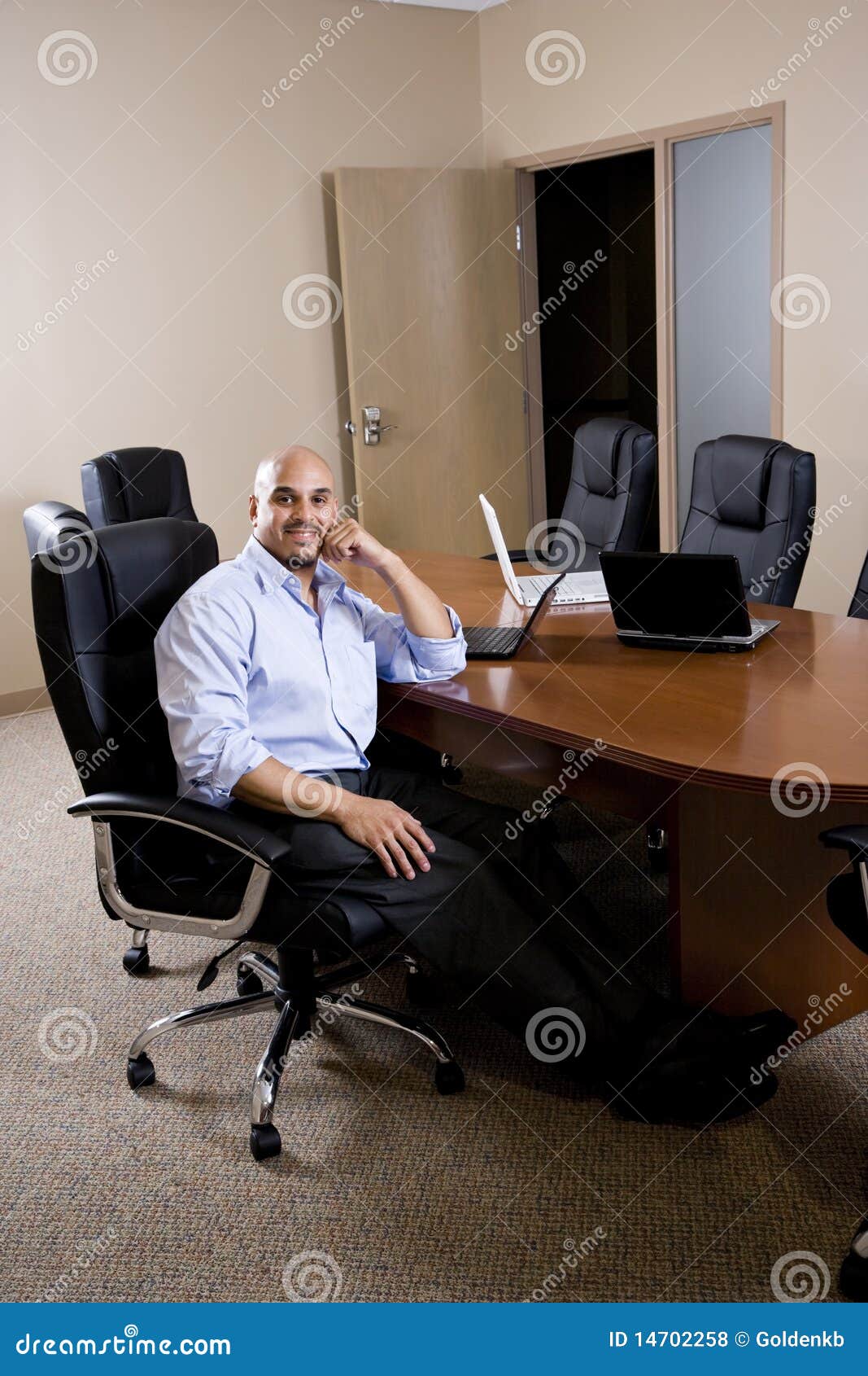 Mid-adult Hispanic Office Worker in Boardroom Stock Photo - Image of ...