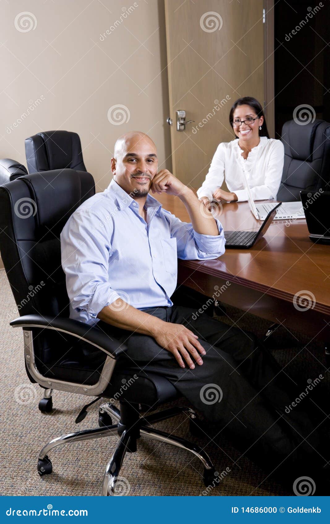 Mid-adult Hispanic Office Workers in Boardroom Stock Photo - Image of ...