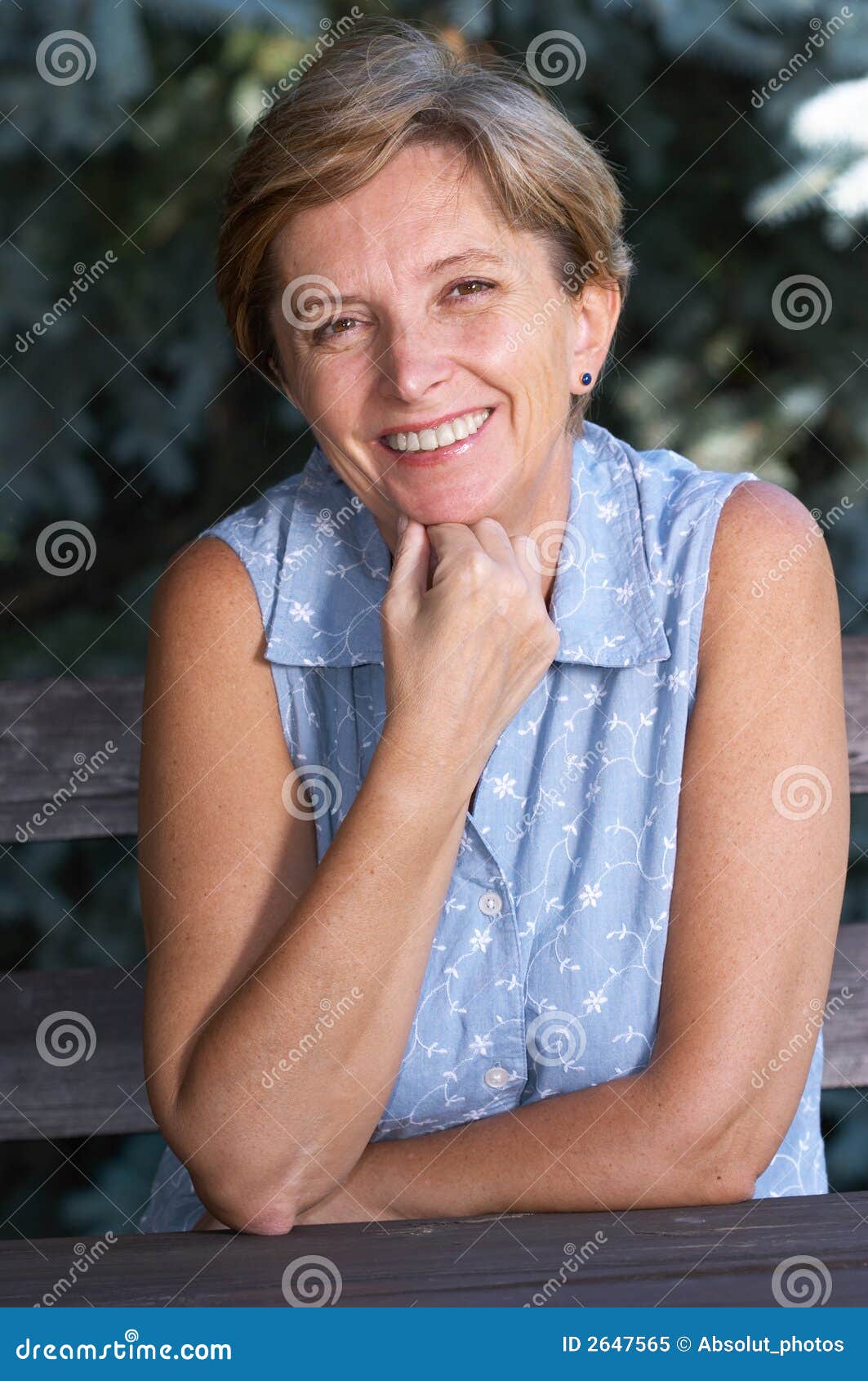 Mid adult smiling stock image. Image of hand, vertical - 2647565