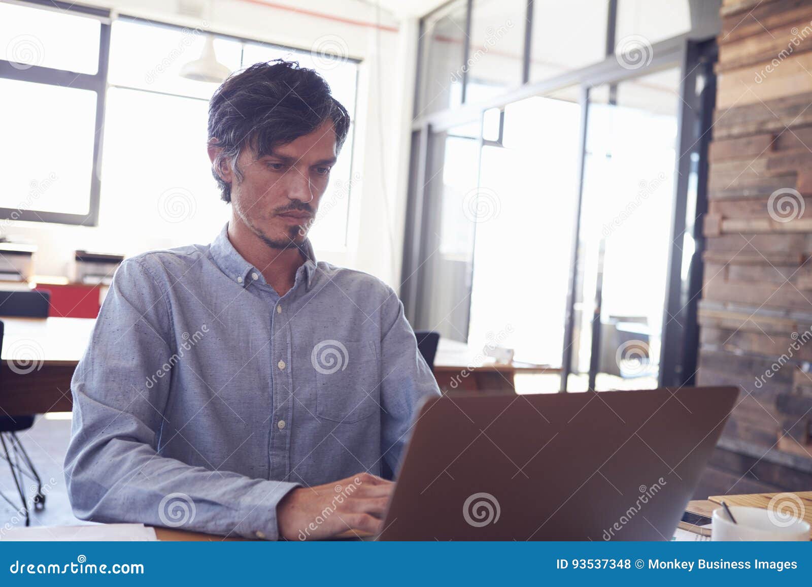 Mid-adult White Man Working in an Office Using Laptop, Close Up Stock ...