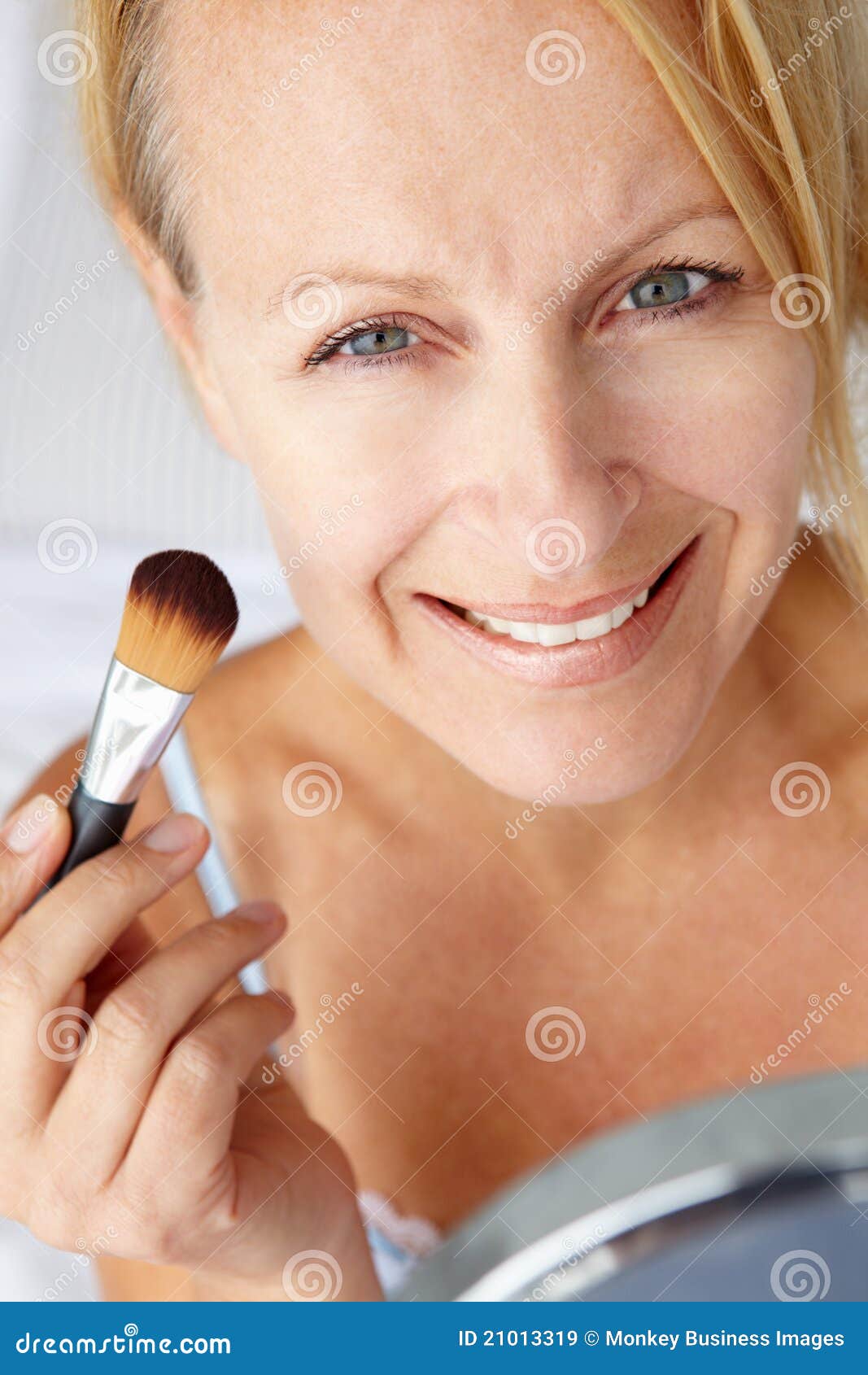 Mid Age Woman Putting on Make-up Stock Image - Image of happy, brush ...