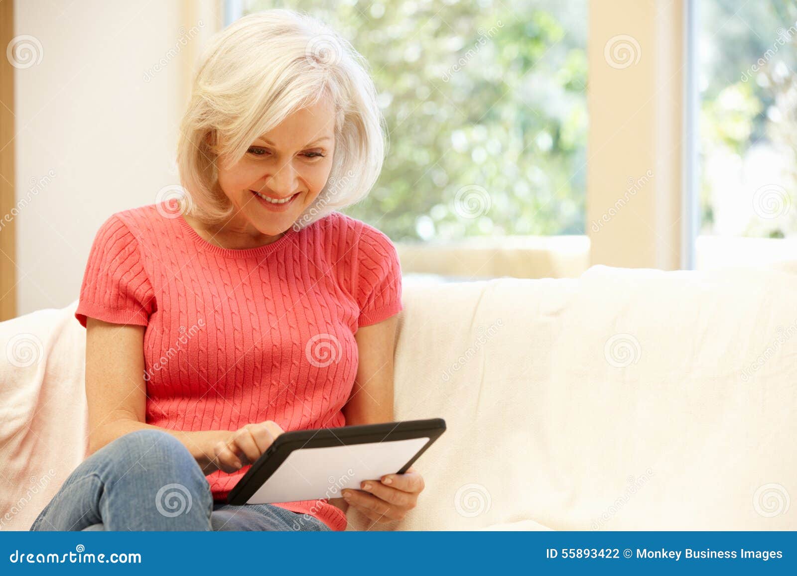 Mid Age Woman Using Tablet at Home Stock Photo - Image of caucasian ...