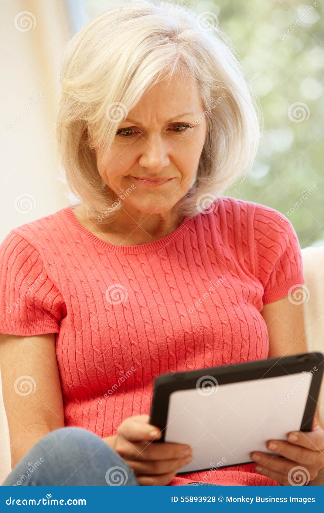 Mid Age Woman Using Tablet at Home Stock Photo - Image of internet ...