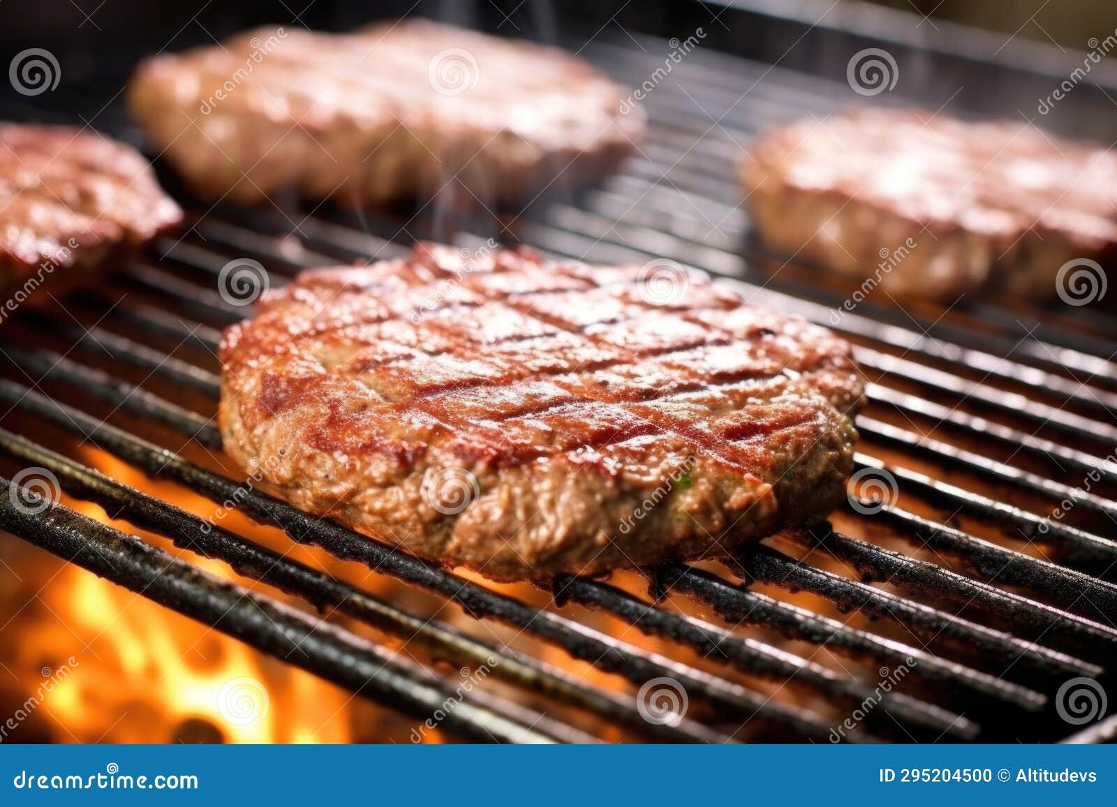 Mid-flip Beef Patty in a Broiler with Grill Lines Stock Photo - Image ...