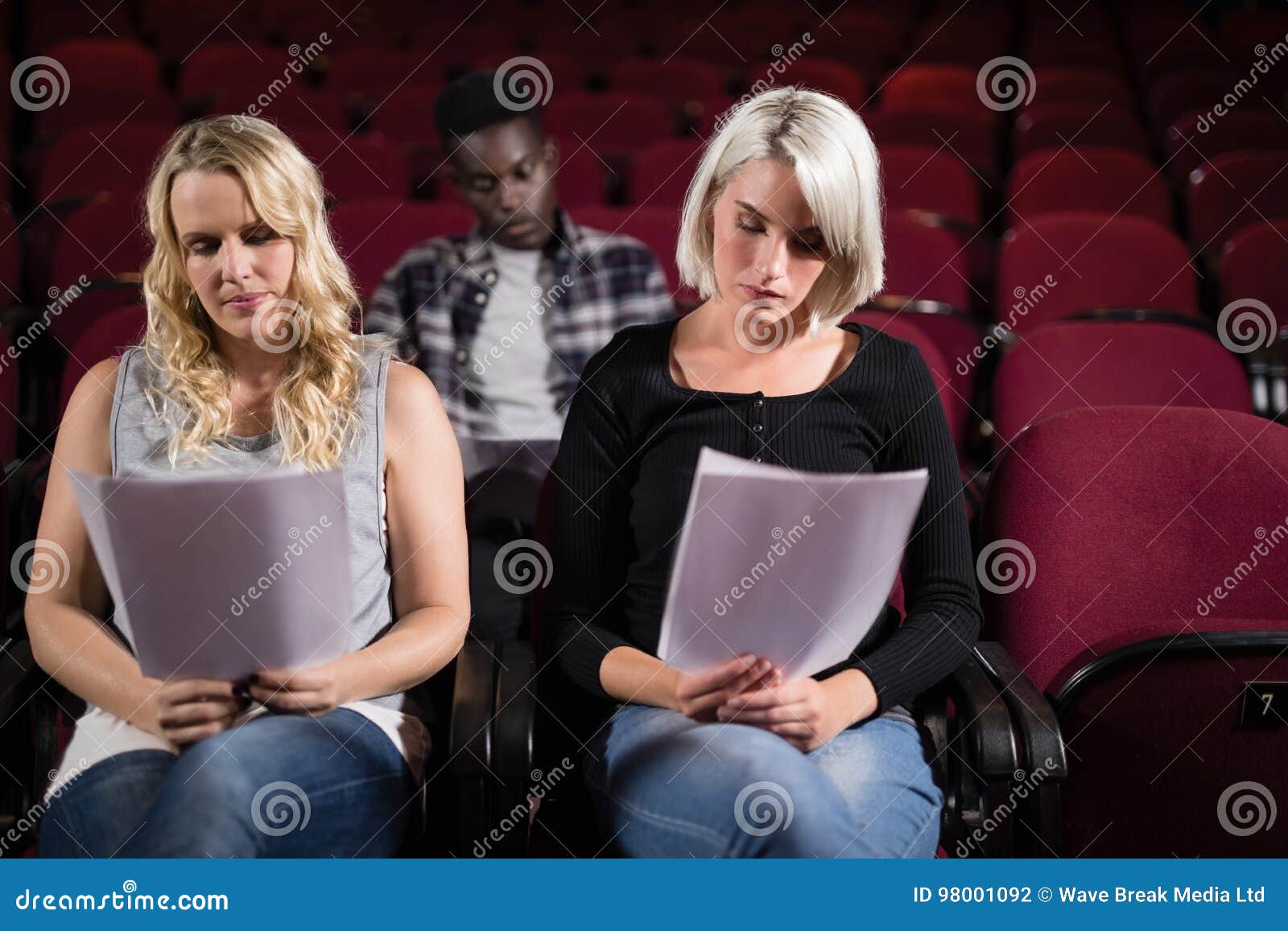 Actors Reading Their Scripts on Stage in Theatre Stock Photo - Image of ...