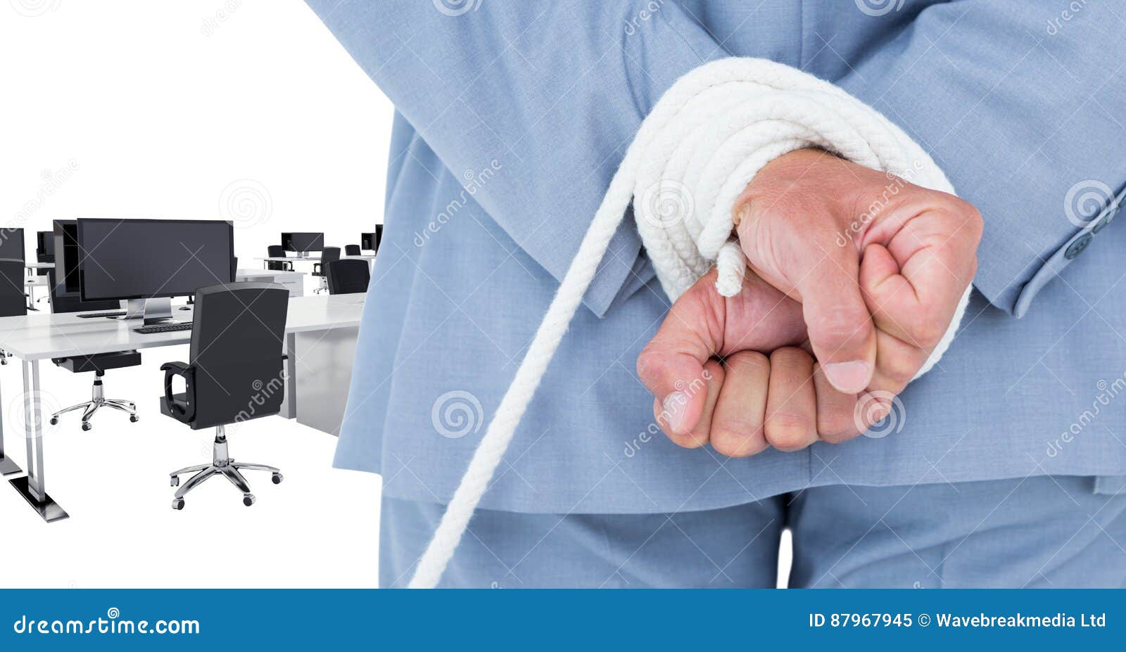 Mid Section of Businessman Being Tied Up with Rope in Office Stock ...