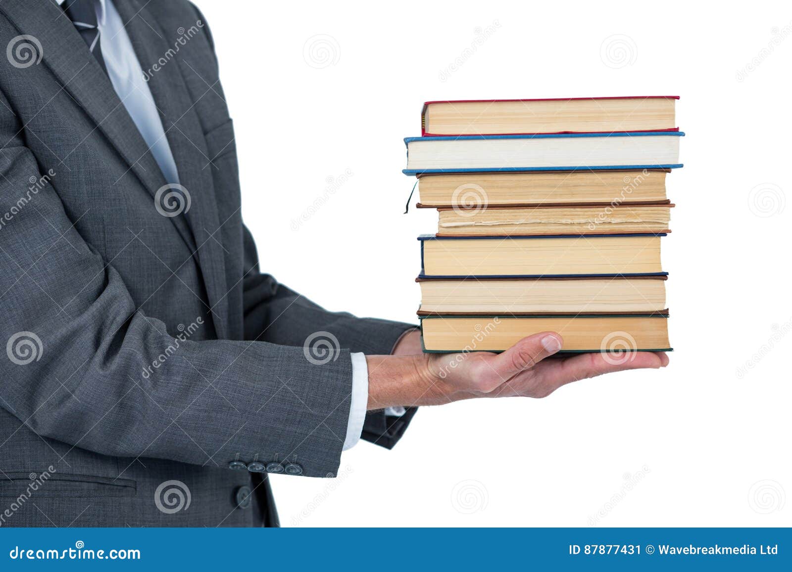 Mid Section of Businessman Holding Stack of Books Stock Image - Image ...