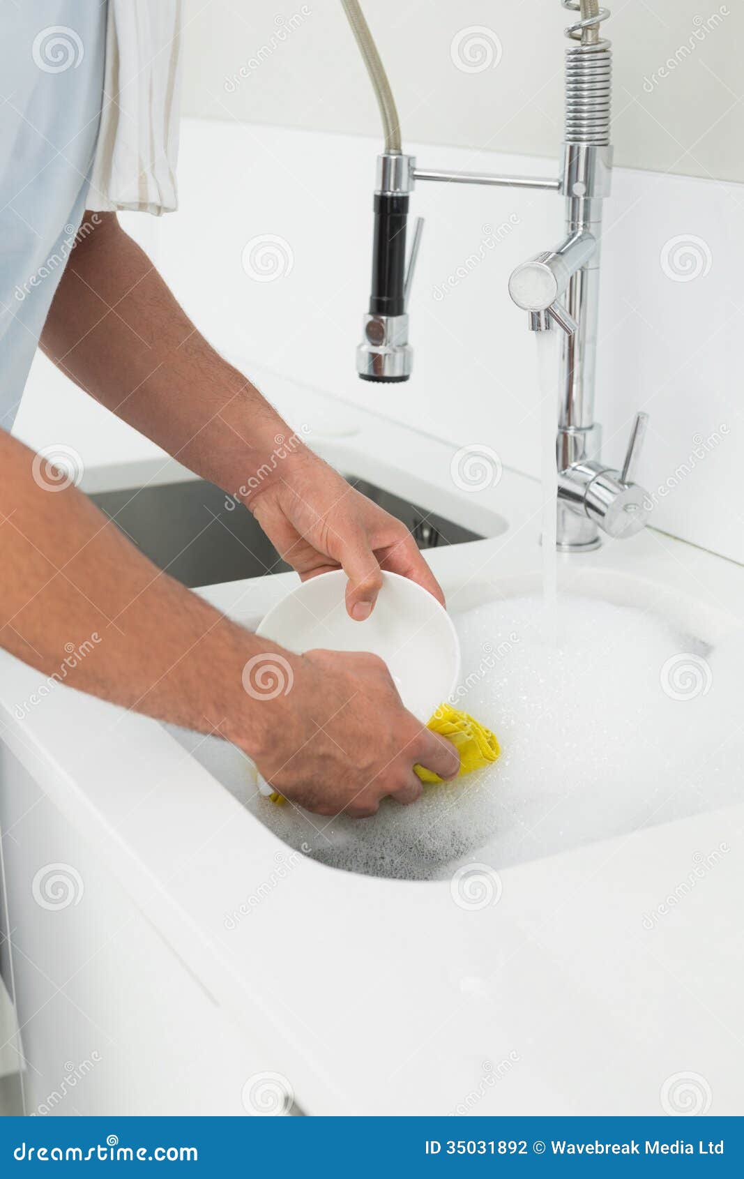 Mid Section of Man Doing the Dishes at Kitchen Sink Stock Photo - Image ...