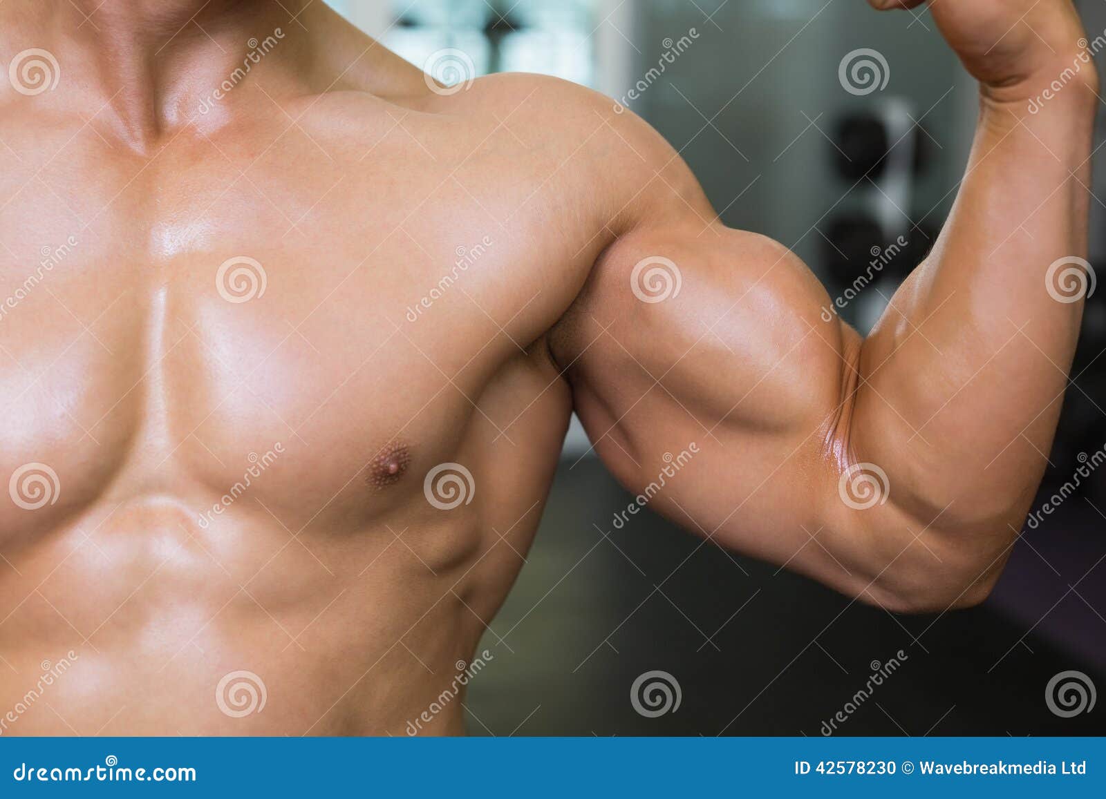Mid Section of Muscular Man Flexing Muscles Stock Photo - Image of ...