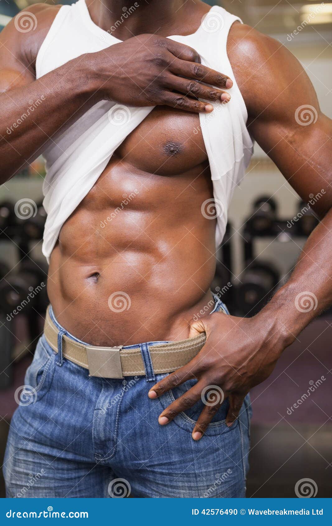 Mid Section Of Muscular Man Flexing Muscles Royalty-Free Stock Image ...