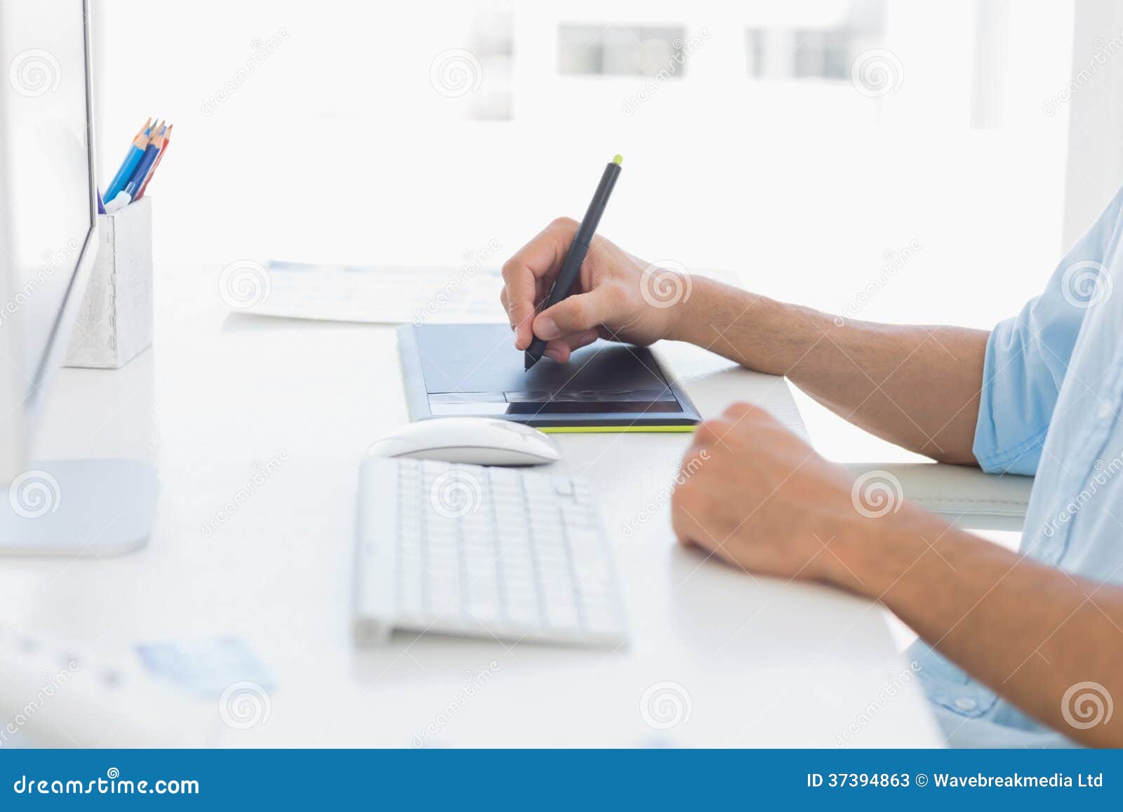 Mid Section of a Photo Editor Using Graphics Tablet Stock Image - Image ...