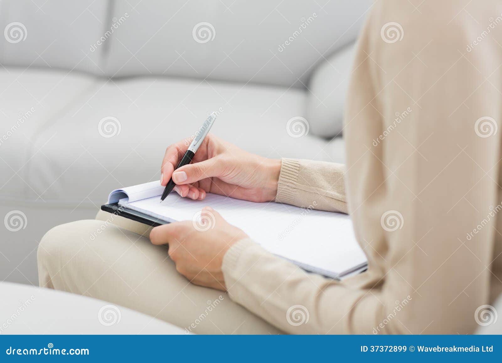 Mid Section of a Psychologist Writing Notes Stock Image - Image of sofa ...