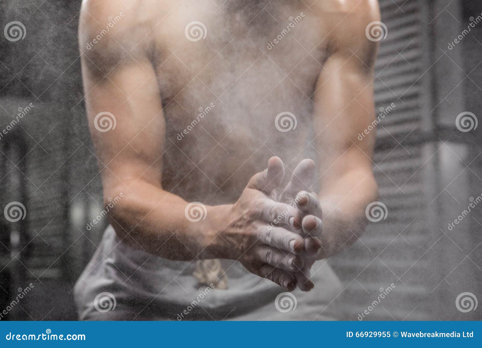 Mid Section of Shirtless Man Clapping Hands with Talc Stock Image ...