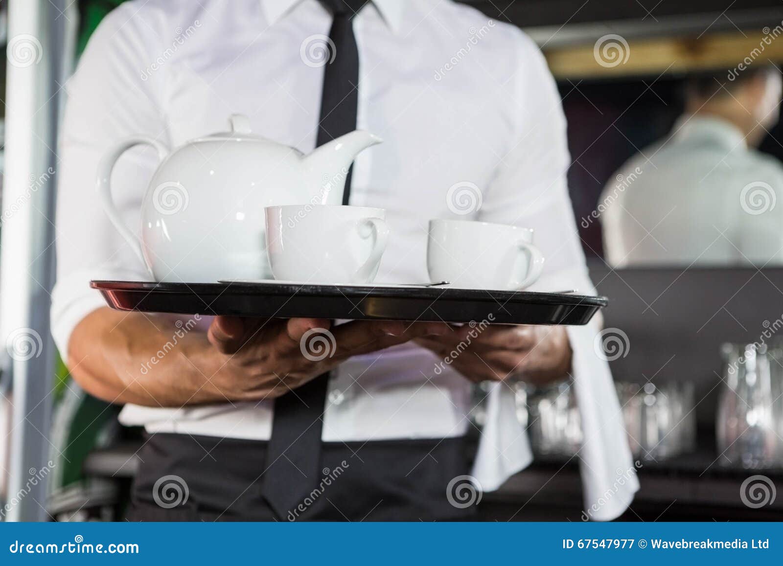 Mid Section of Waiter Serving Tea Stock Image - Image of hospitality ...
