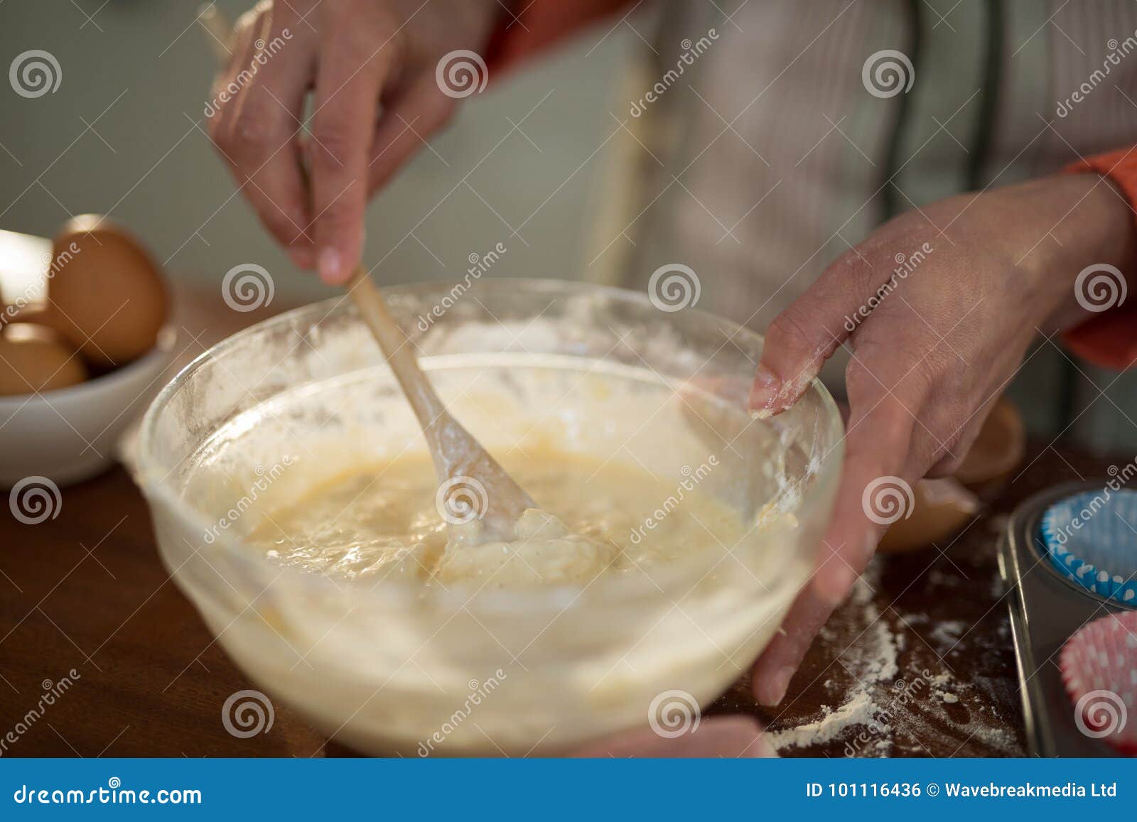 Woman Mixing Eggs and Wheat Flour in a Bowl Stock Photo - Image of ...