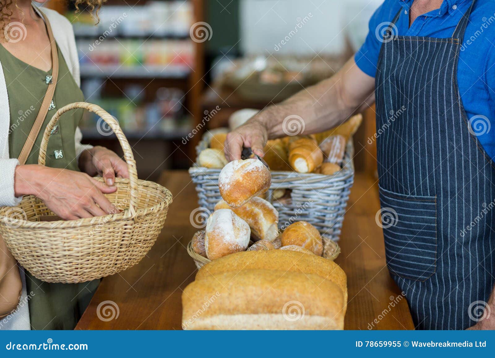 Mid Section of Woman Purchasing Bread at Bakery Store Stock Image ...