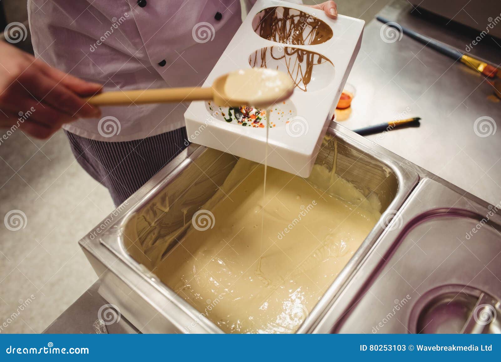 Mid Section of Worker Filling Chocolate Mould Stock Image - Image of ...