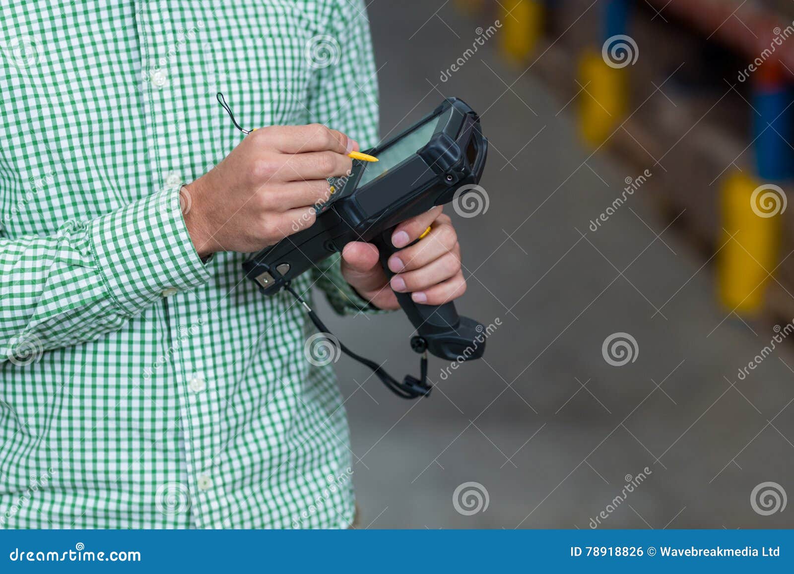 Mid Section of Worker Using Hand Held Computer Stock Photo - Image of ...