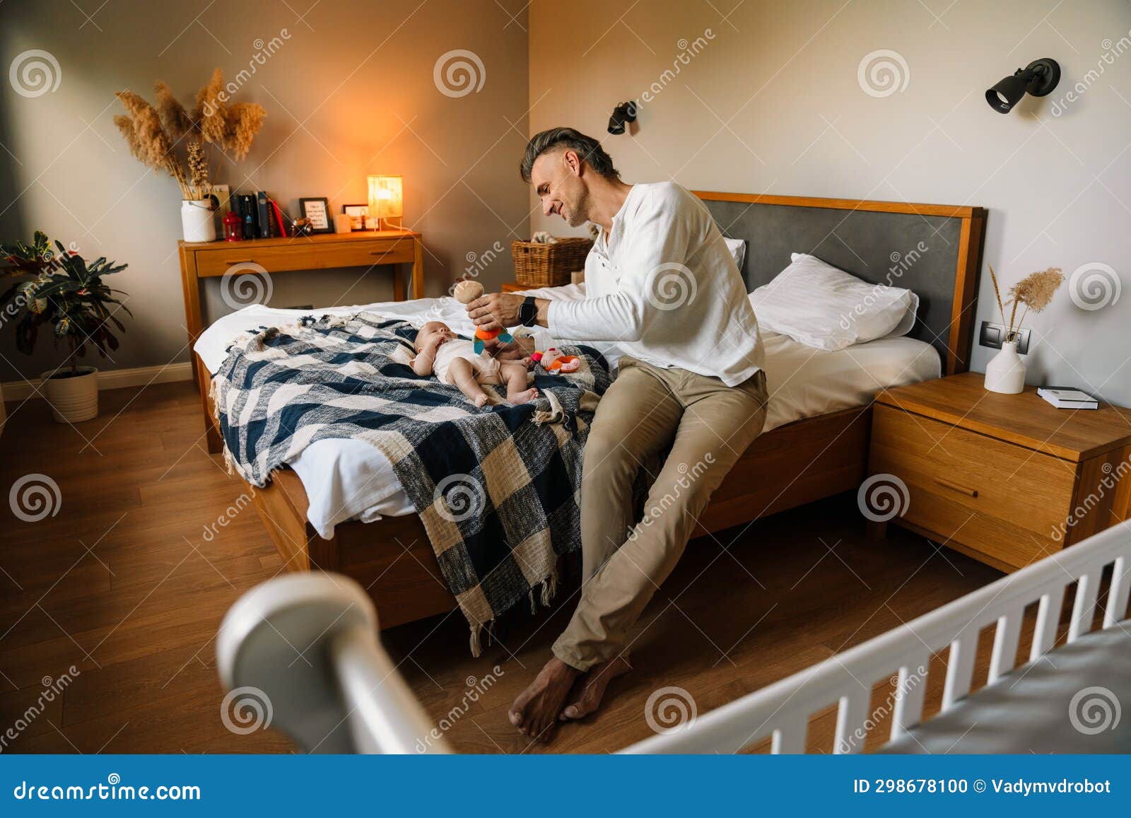 Mid White Father Smiling while Spending Time with His Baby Stock Photo ...