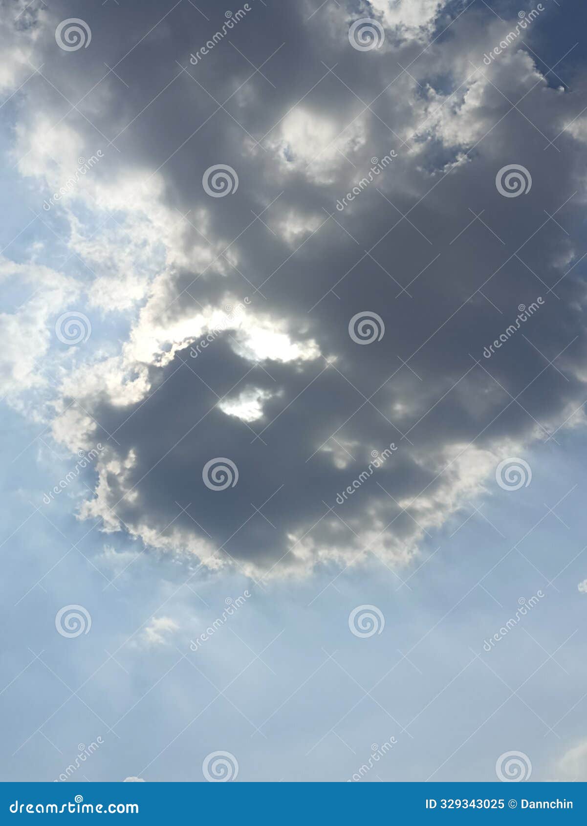 The Midday Sun Covered by a Clump of Clouds Stock Image - Image of ...