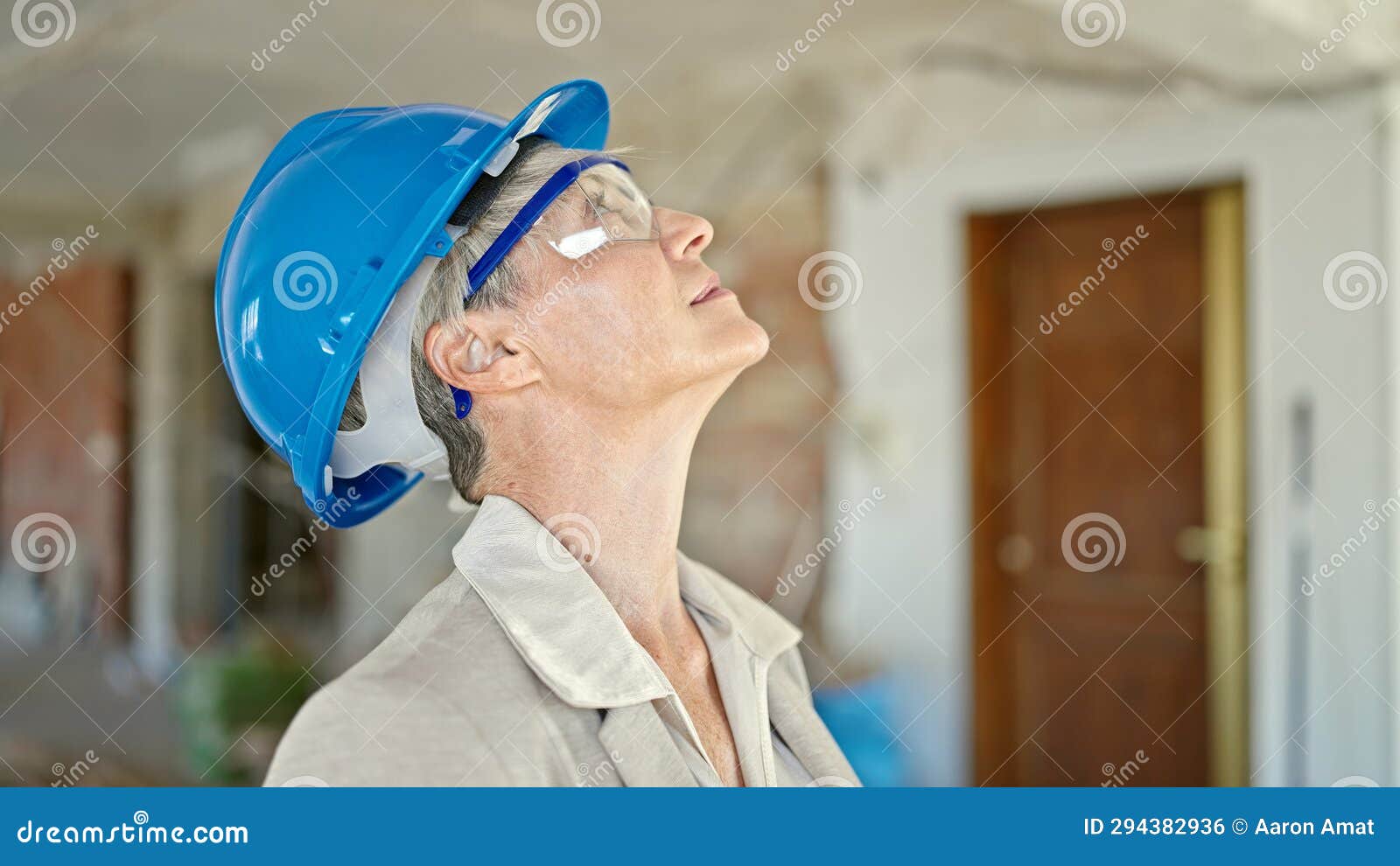 Middle Age Blonde Woman Architect Standing with Relaxed Expression ...