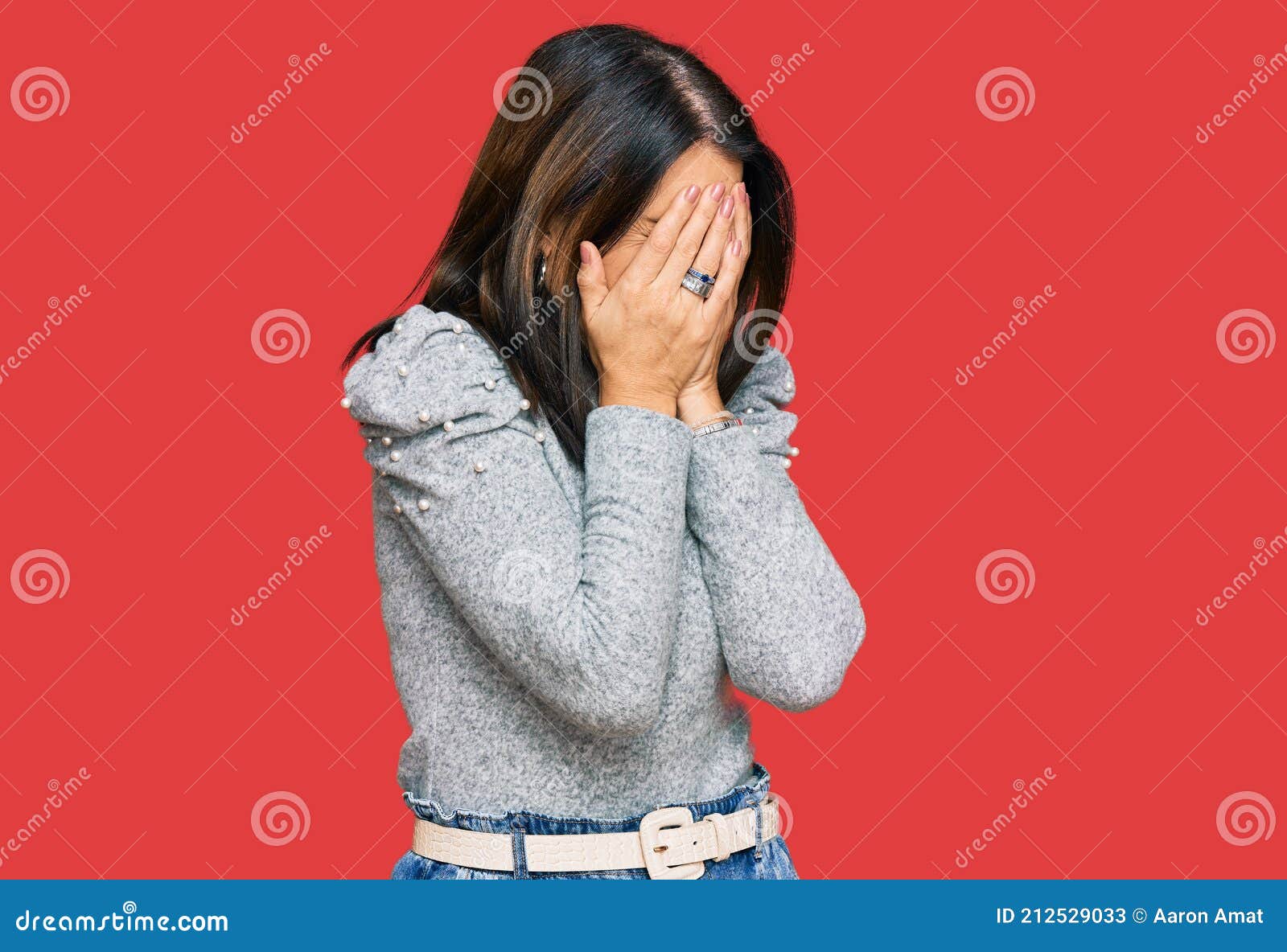 Middle Age Brunette Woman Wearing Casual Clothes With Sad Expression