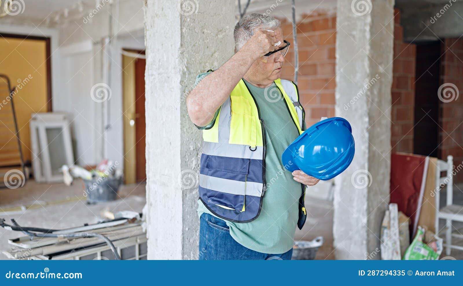 Middle Age Grey-haired Man Builder Sweating at Construction Site Stock ...