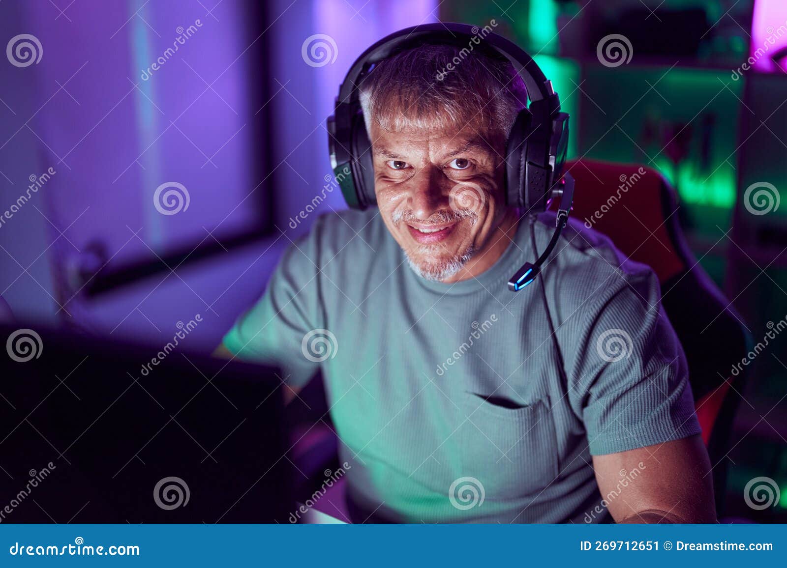 Middle Age Grey-haired Man Streamer Playing Video Game Using Computer ...