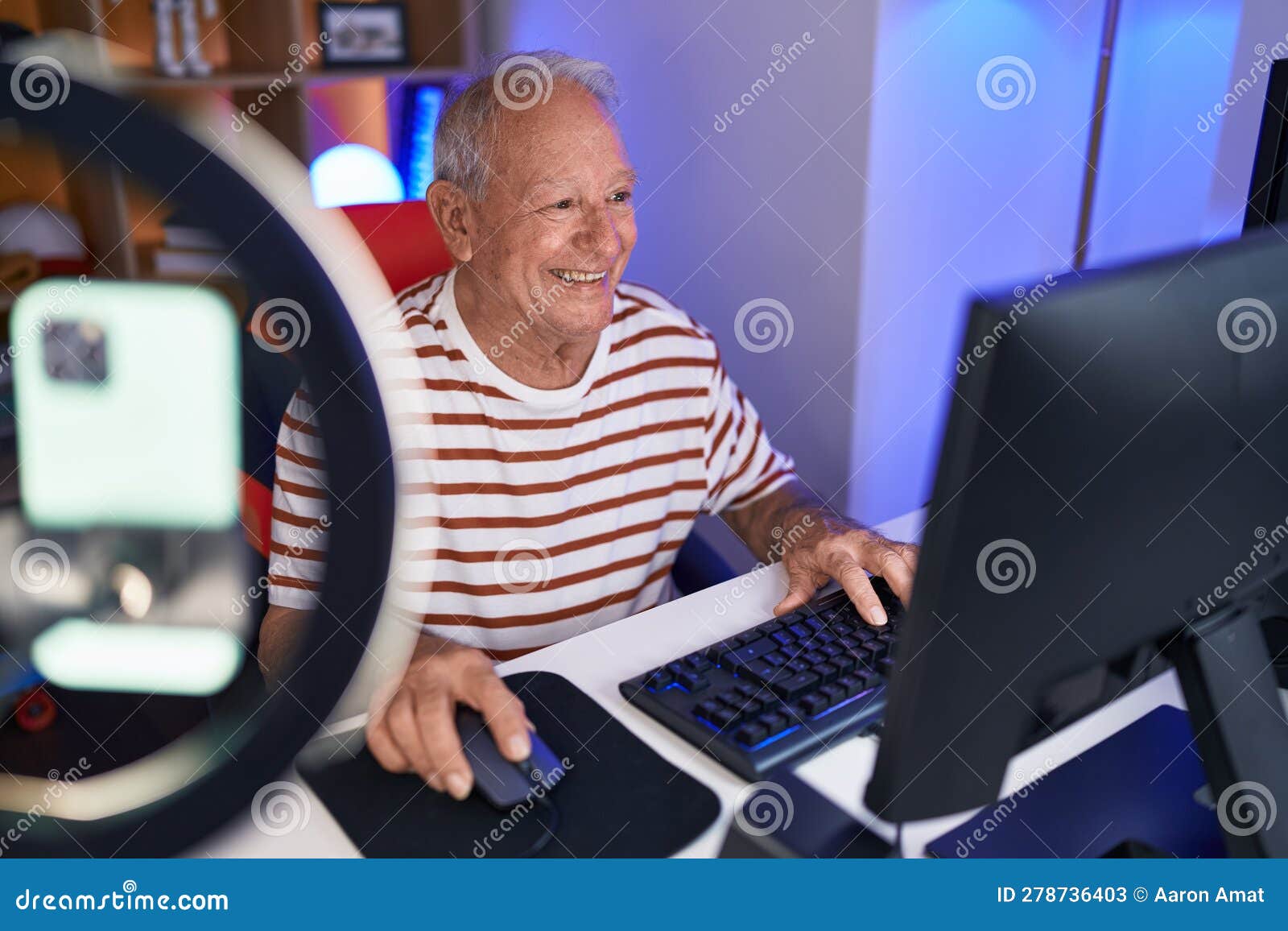 Middle Age Grey-haired Man Streamer Playing Video Game Using Computer ...
