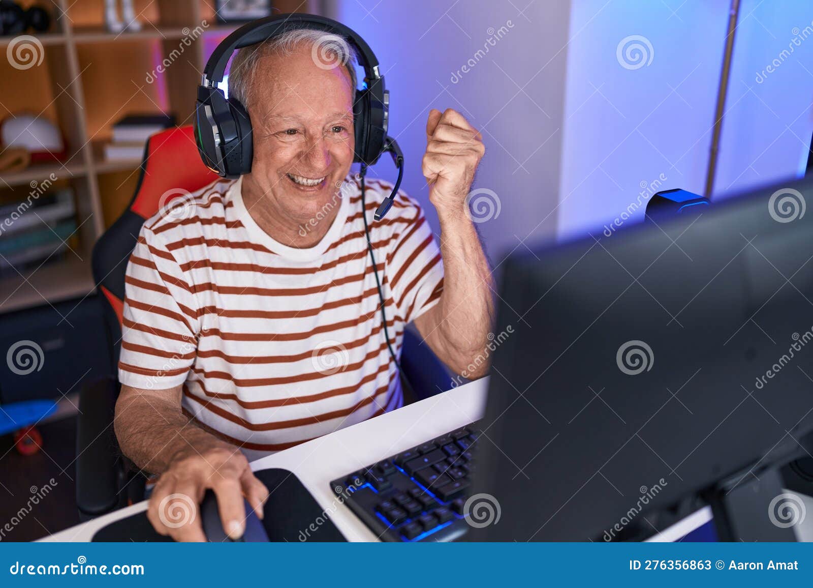 Middle Age Grey-haired Man Streamer Playing Video Game with Winner ...