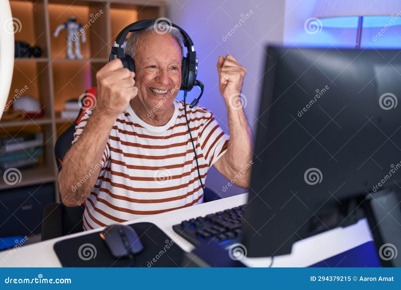 Middle Age Grey-haired Man Streamer Playing Video Game with Winner ...