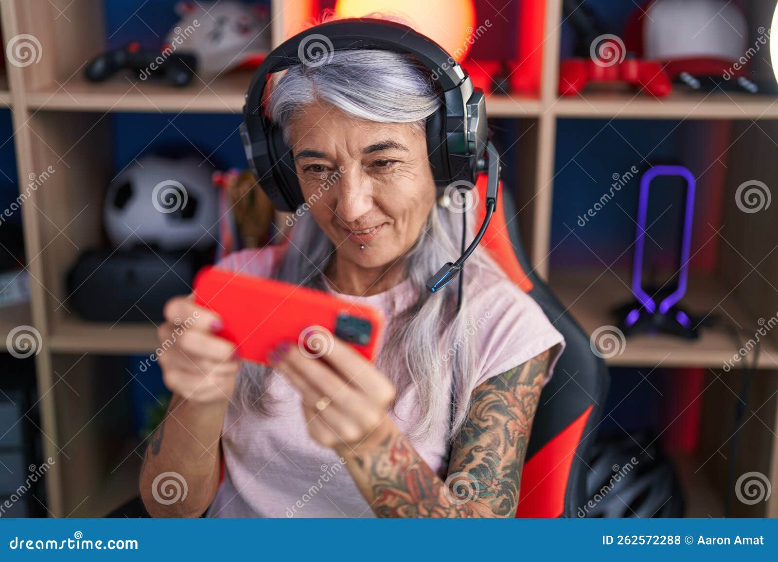 Middle Age Grey-haired Woman Streamer Playing Video Game Using ...