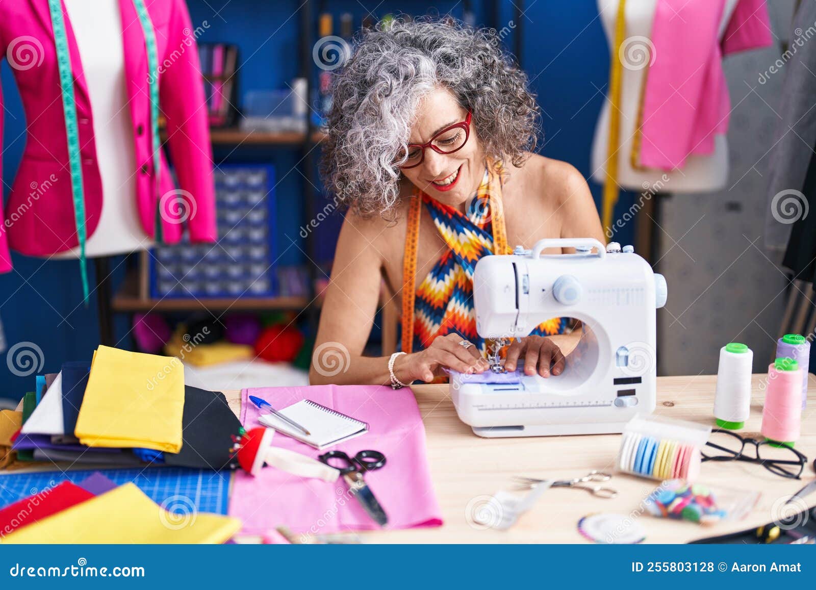 Middle Age Grey-haired Woman Tailor Smiling Confident Using Sewing ...
