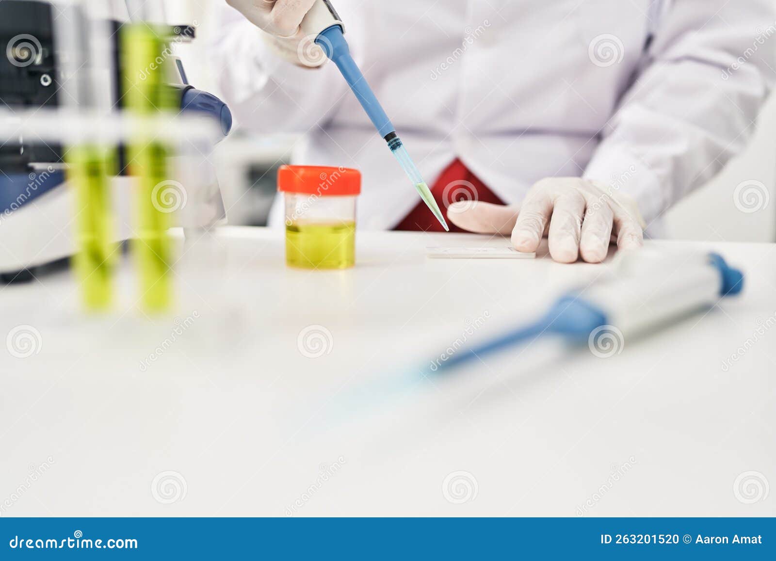 Middle Age Hispanic Woman Doing Urine Test at Laboratory Stock Photo ...