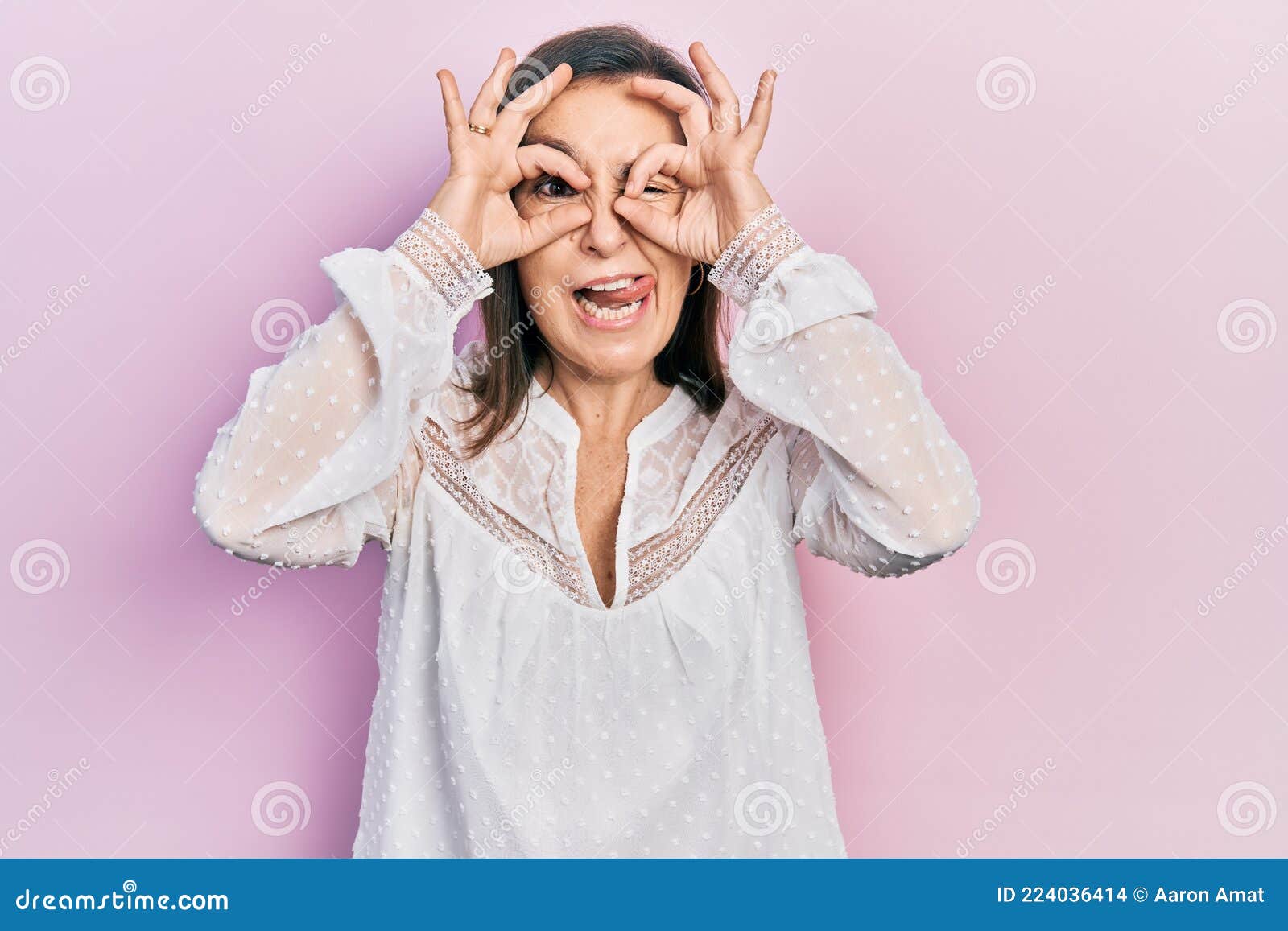 Middle Age Hispanic Woman Wearing Casual Clothes Doing Ok Gesture Like