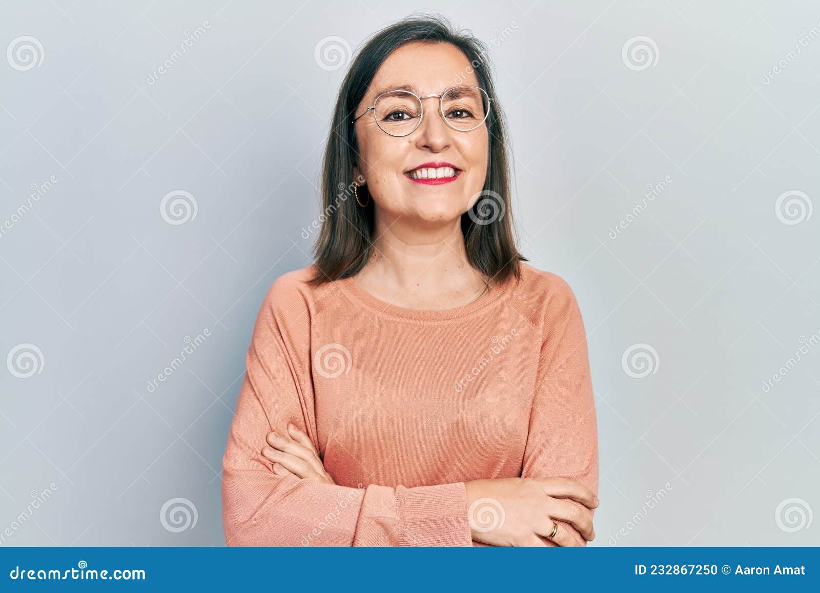 Middle Age Hispanic Woman Wearing Casual Clothes And Glasses Happy Face