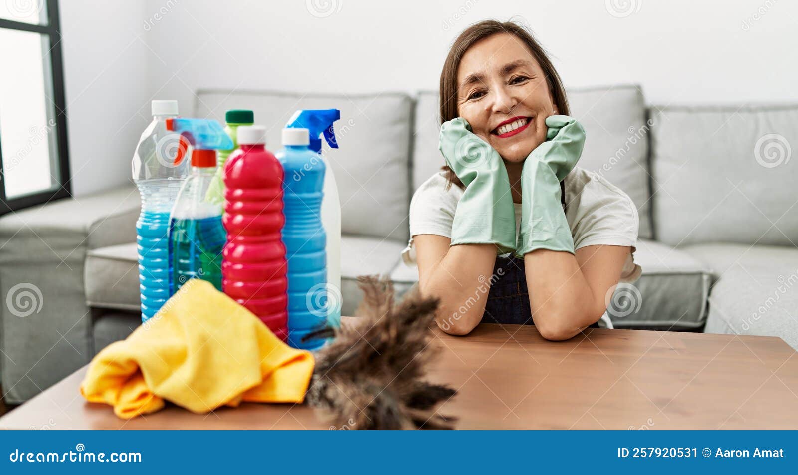 Middle Age Hispanic Woman Working As Housekeeper at Home Stock Image ...