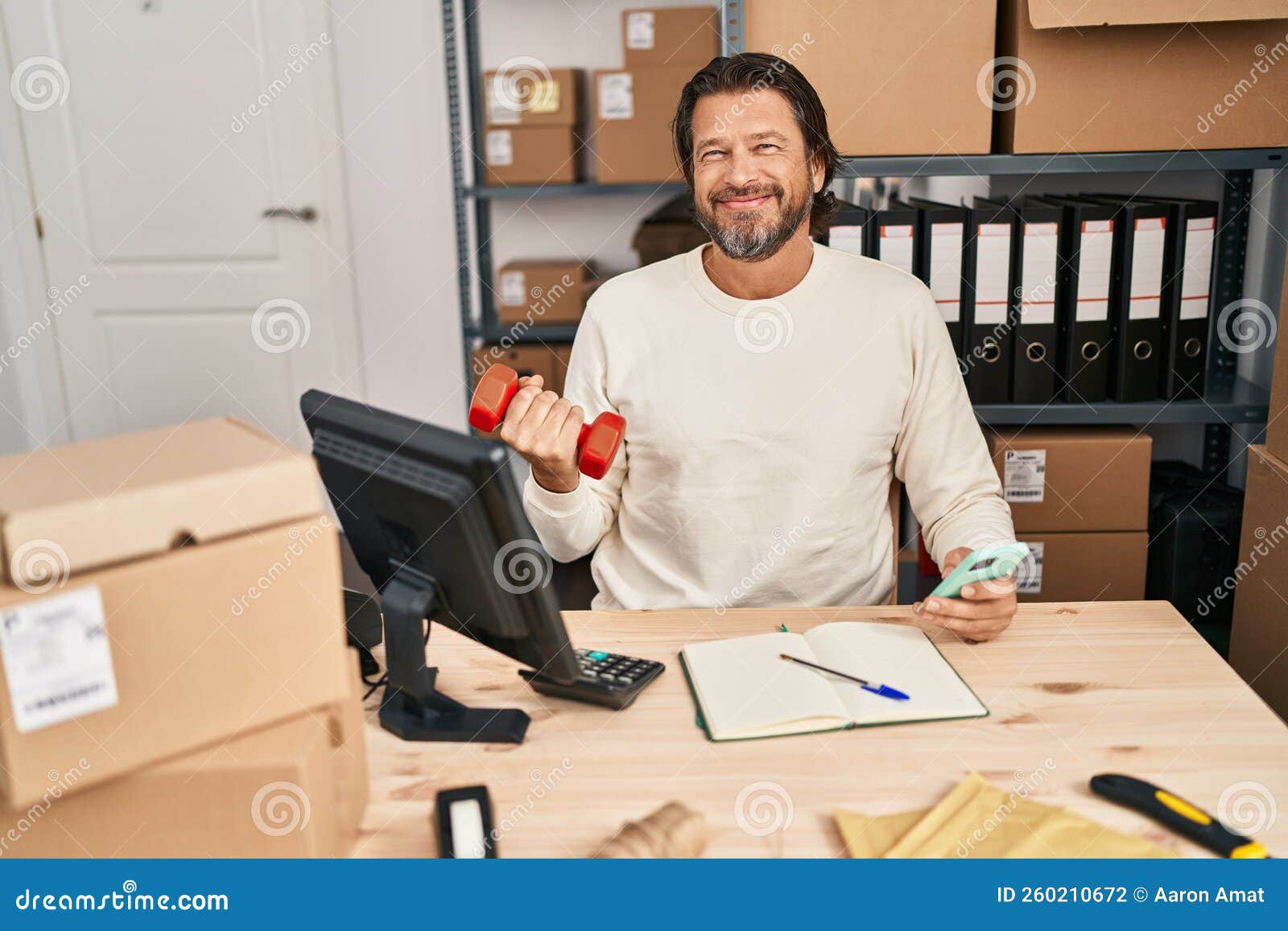 Middle Age Man Ecommerce Business Worker Using Smartphone Training with ...