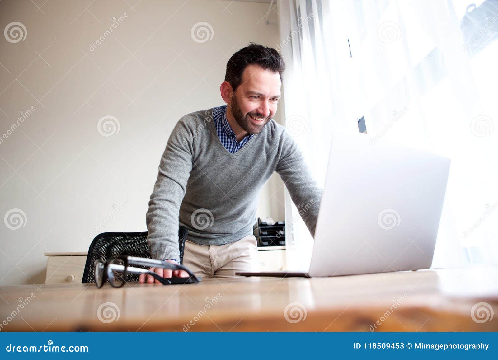 Middle Age Man Looking at Laptop Computer Stock Image - Image of ...