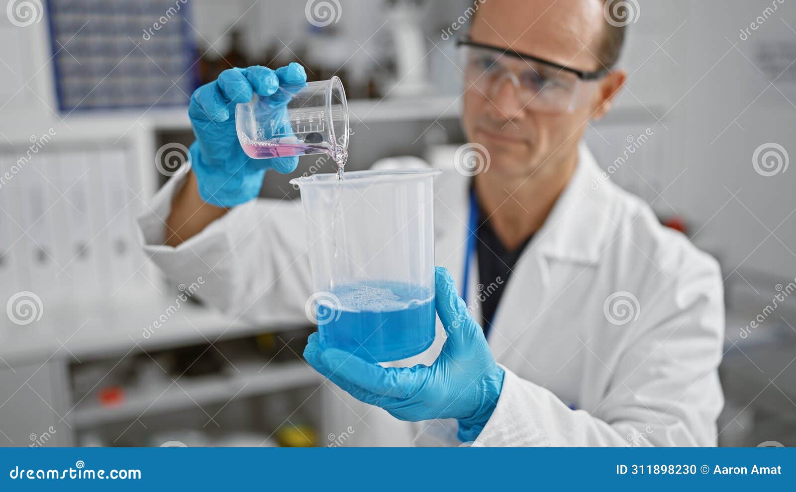 Middle Age Man Scientist Measuring Liquid at Laboratory Stock Photo ...