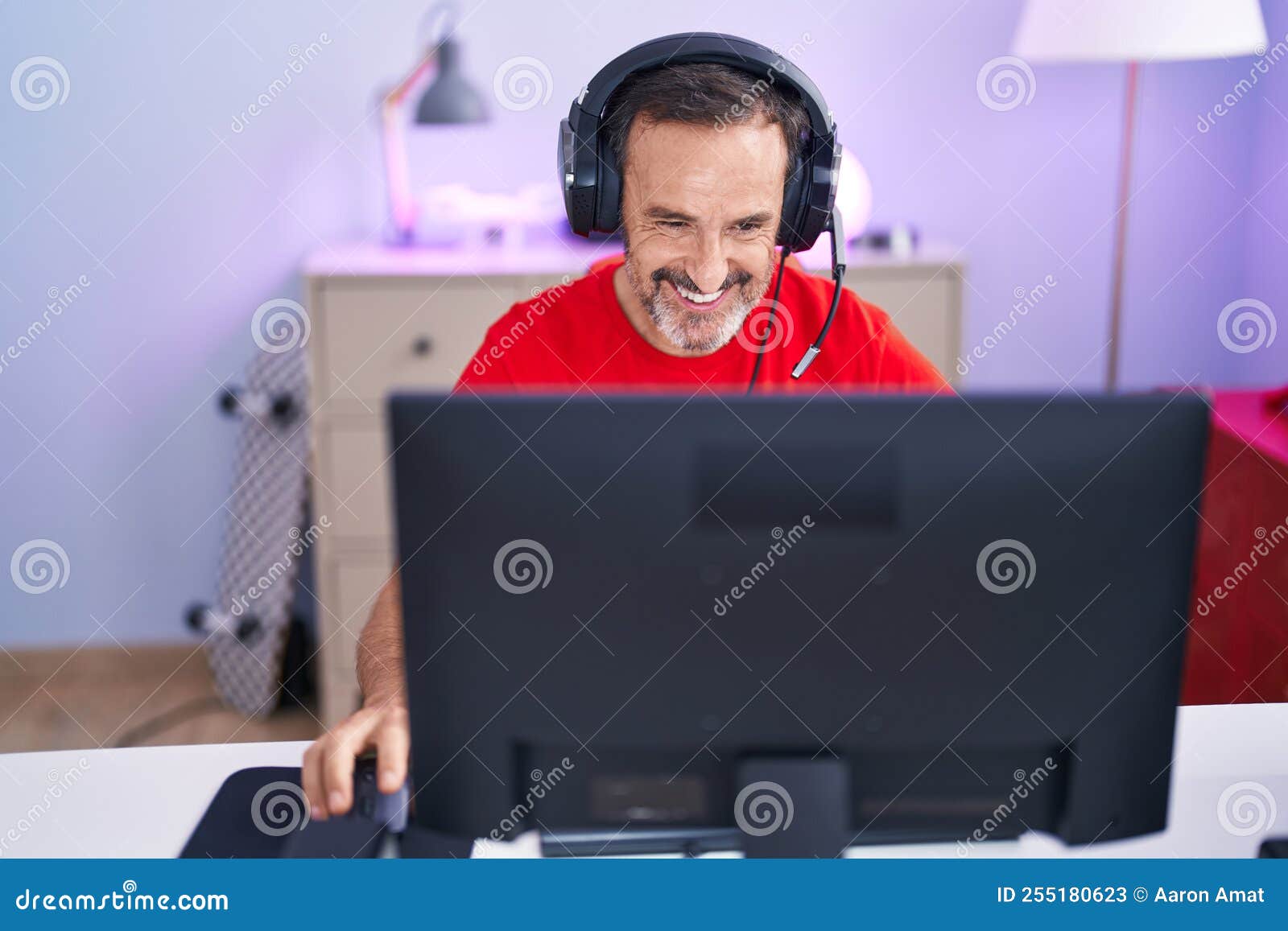 Middle Age Man Streamer Playing Video Game Using Computer at Gaming ...