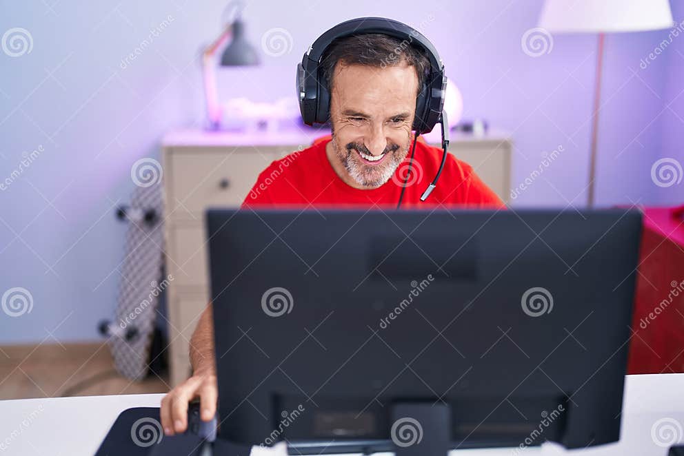 Middle Age Man Streamer Playing Video Game Using Computer at Gaming ...