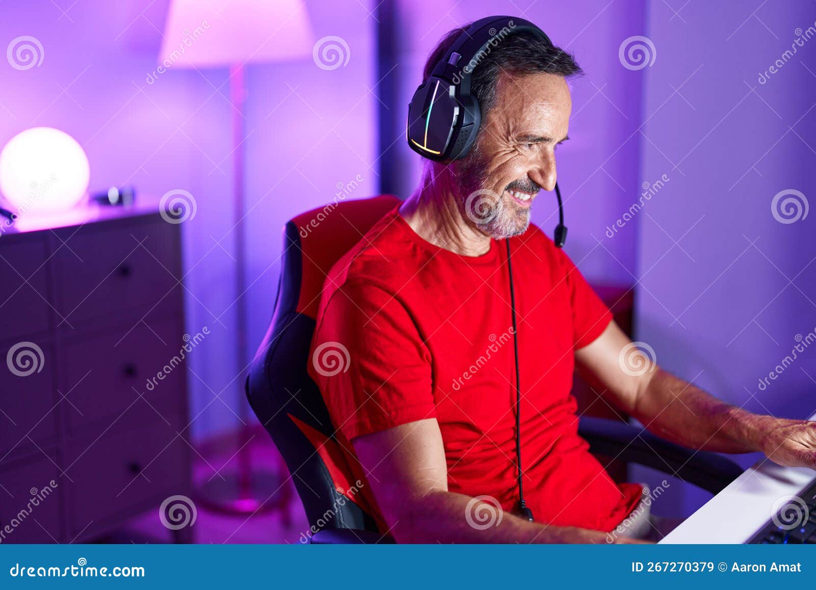 Middle Age Man Streamer Playing Video Game Using Computer at Gaming ...