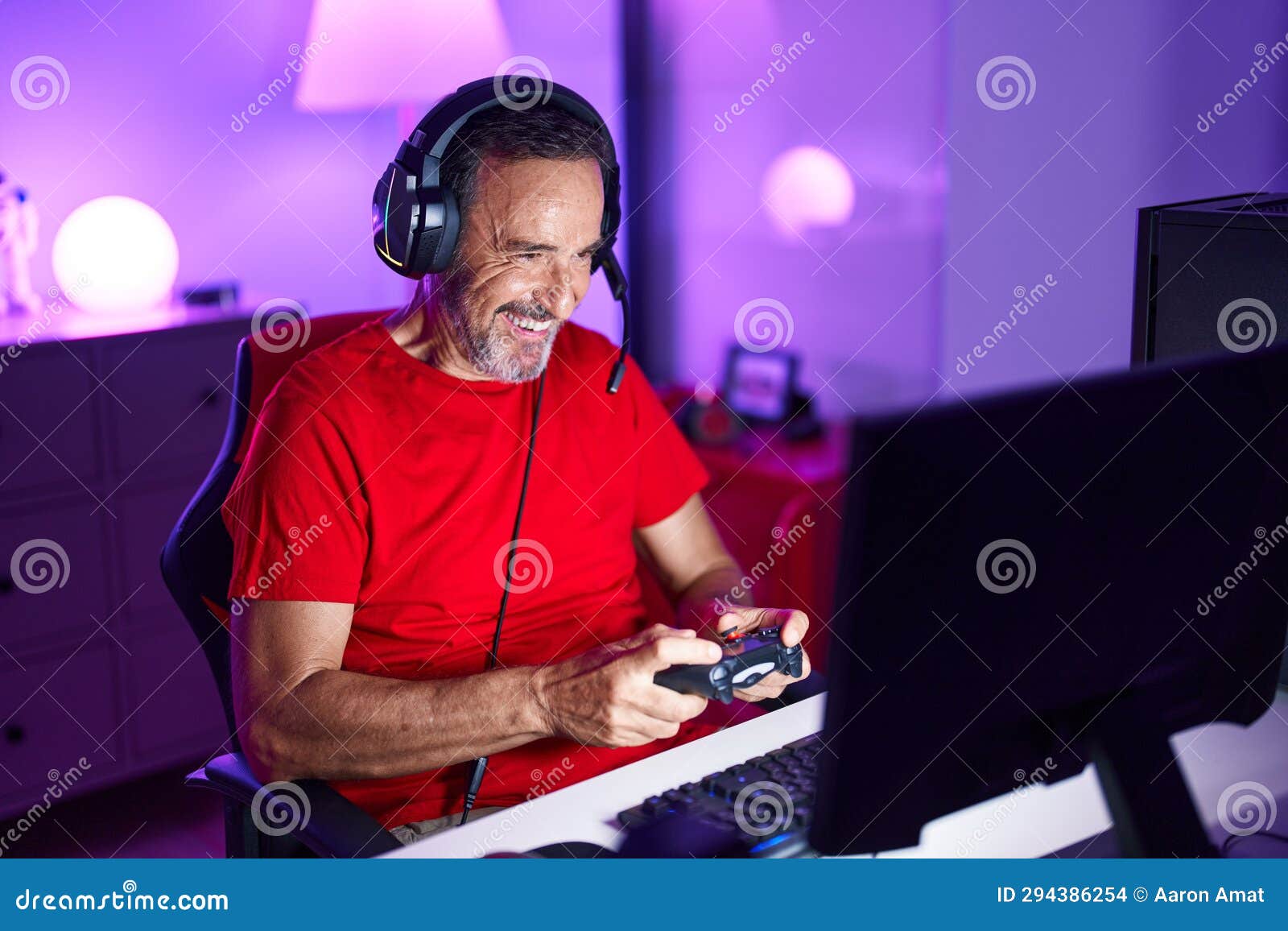 Middle Age Man Streamer Playing Video Game Using Joystick at Gaming ...