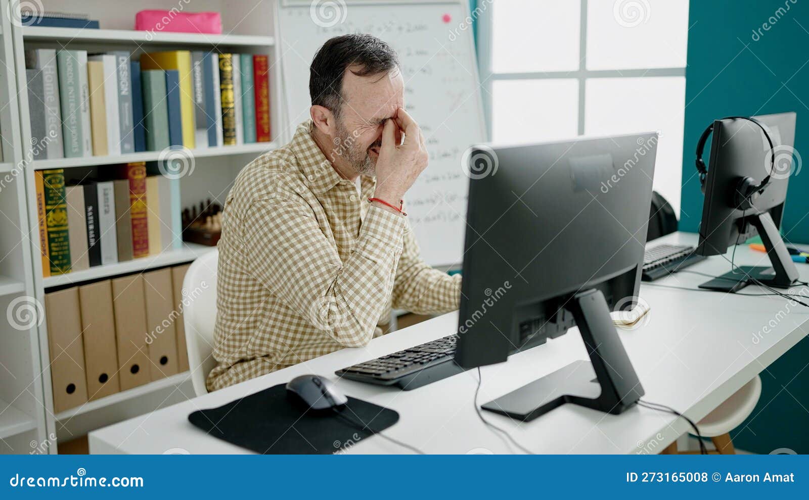 Middle Age Man Teacher Working Stressed at Classroom Stock Photo ...