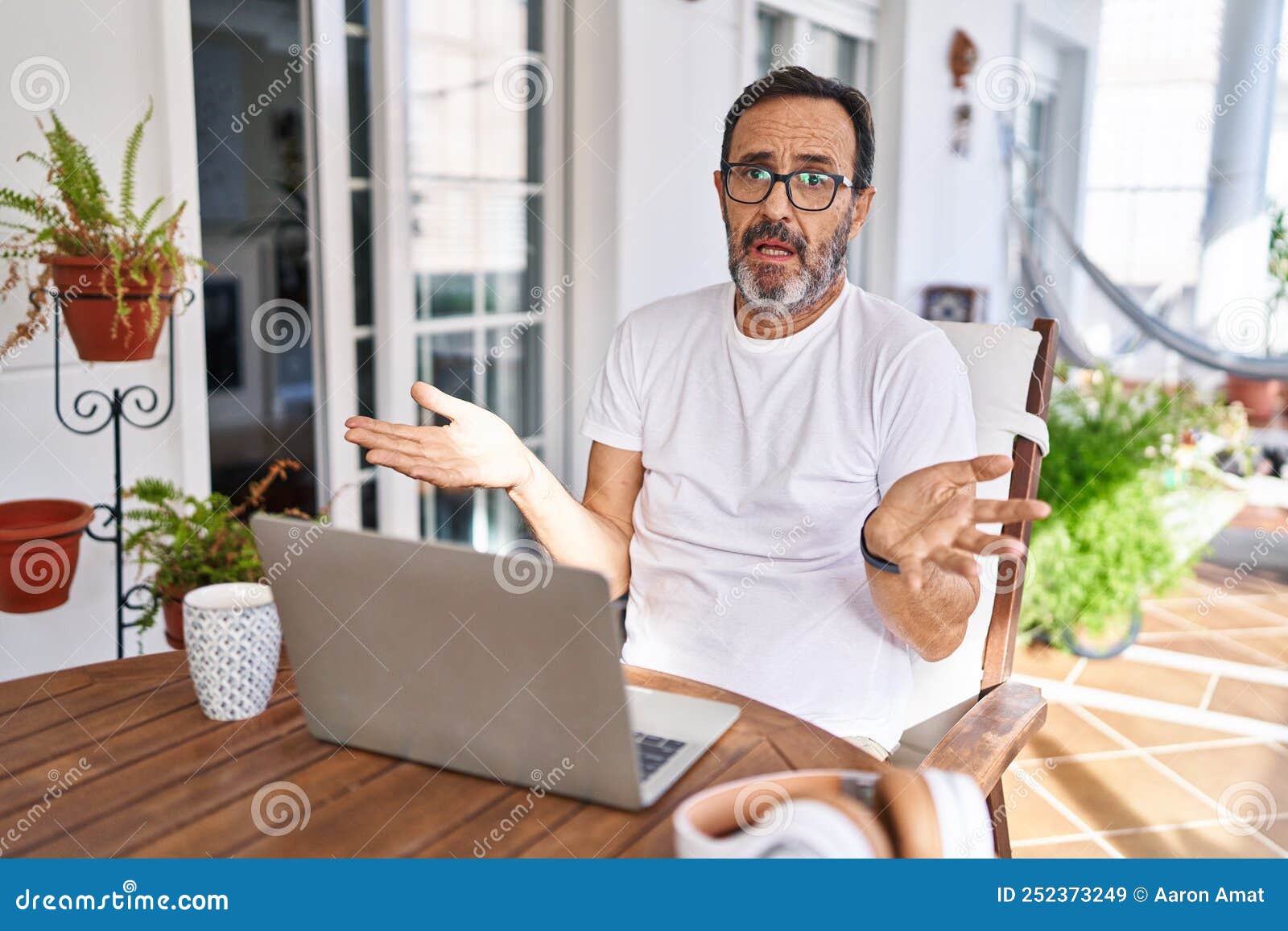 Middle Age Man Using Computer Laptop at Home Clueless and Confused with ...