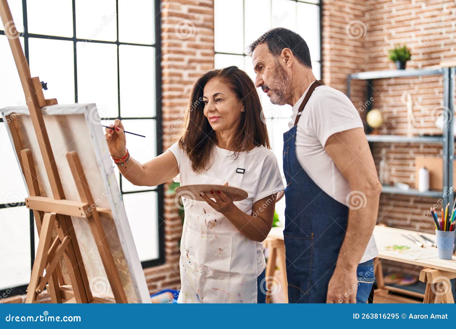 Middle Age Man and Woman Artists Drawing at Art Studio Stock Image ...